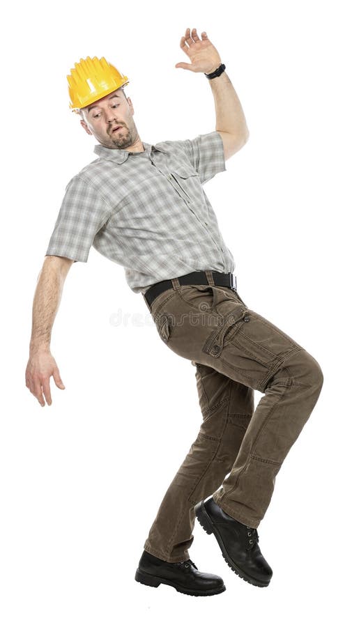 Construction Worker with Yellow Helmet Losing Balance and Trying To ...