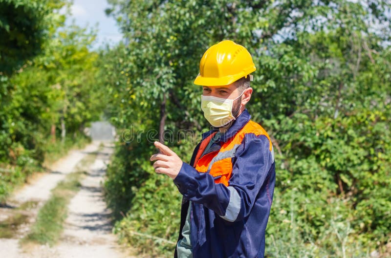 Construction Worker with Yellow Helmet and Medical Mask, Construction ...