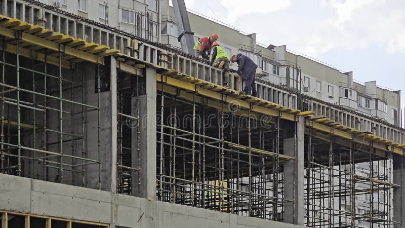 Moscow, Russia July 3, 2025. Construction Workers Building a Concrete ...