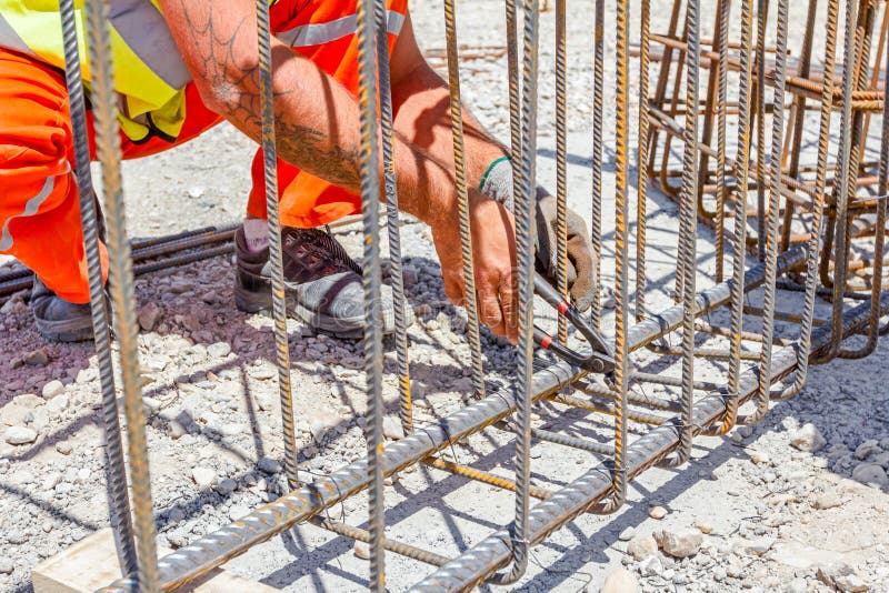 Construction Workers Binding Rebar For Reinforce Concrete Column Stock ...