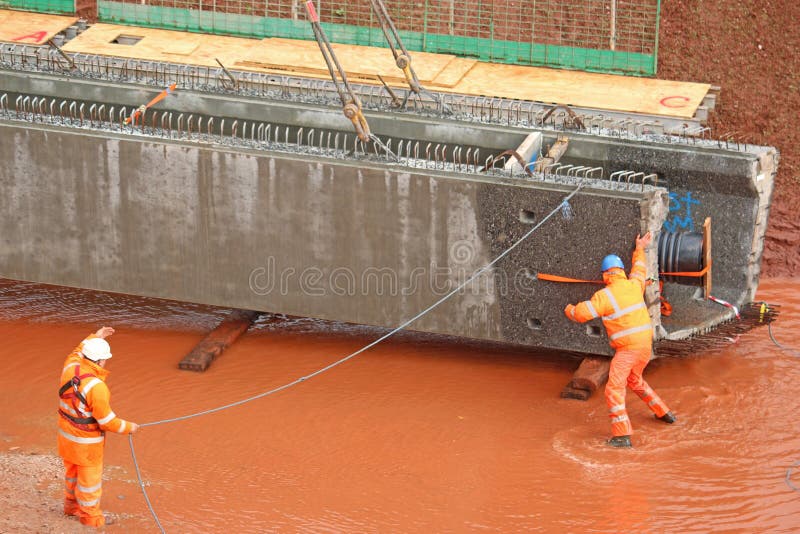 Construction Workers with a Bridge Beam Editorial Photography - Image ...