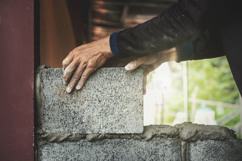 Construction Workers are Building Cement Walls with Brick Blocks Stock ...