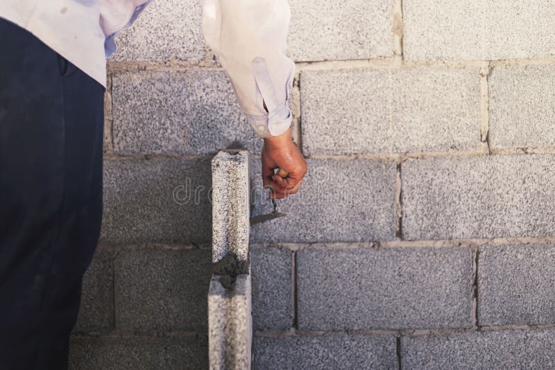 Construction Workers are Building Cement Walls with Brick Blocks Stock ...