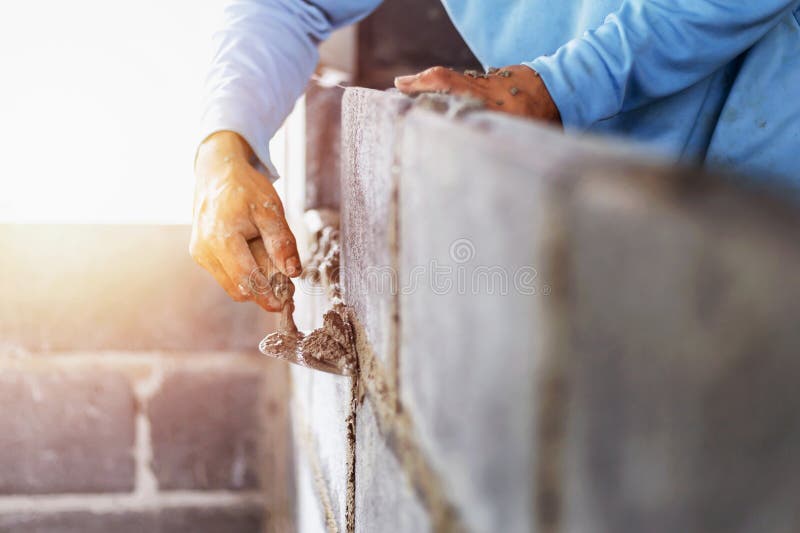 Construction Workers are Building Cement Walls with Brick Blocks Stock ...
