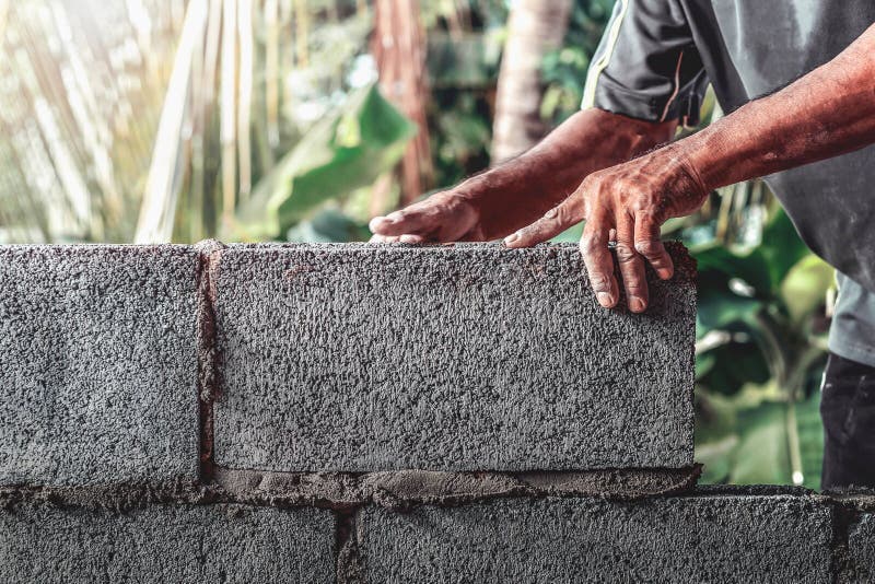 Construction Workers are Building Cement Walls with Brick Blocks Stock ...