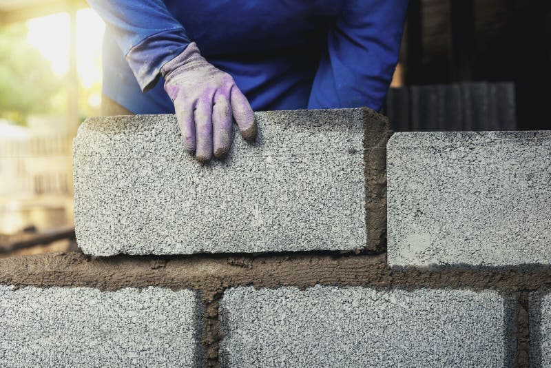 Construction Workers are Building Cement Walls with Brick Blocks Stock ...