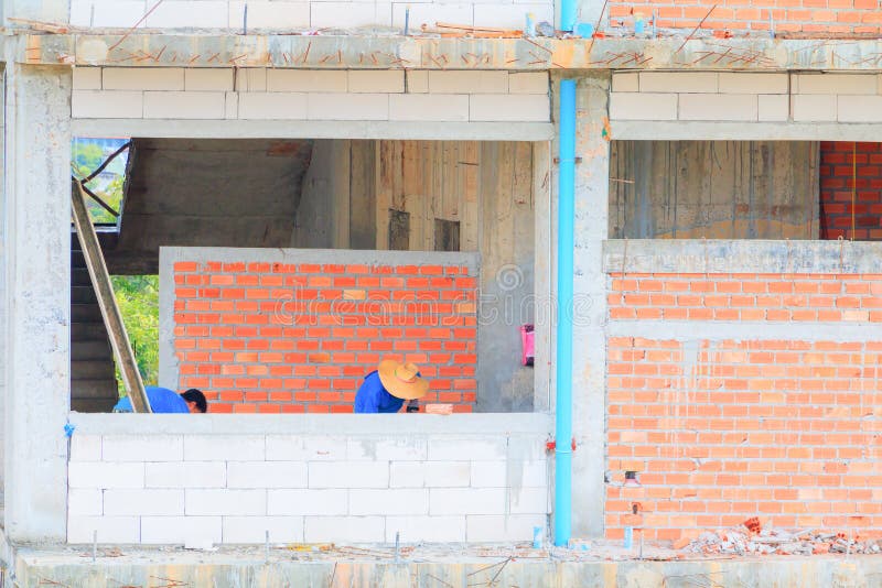 Construction Workers Building Develop of Housing at Laborer Work ...