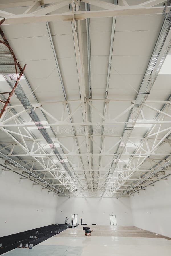 Construction Workers Building a New Factory Floor Stock Photo - Image ...