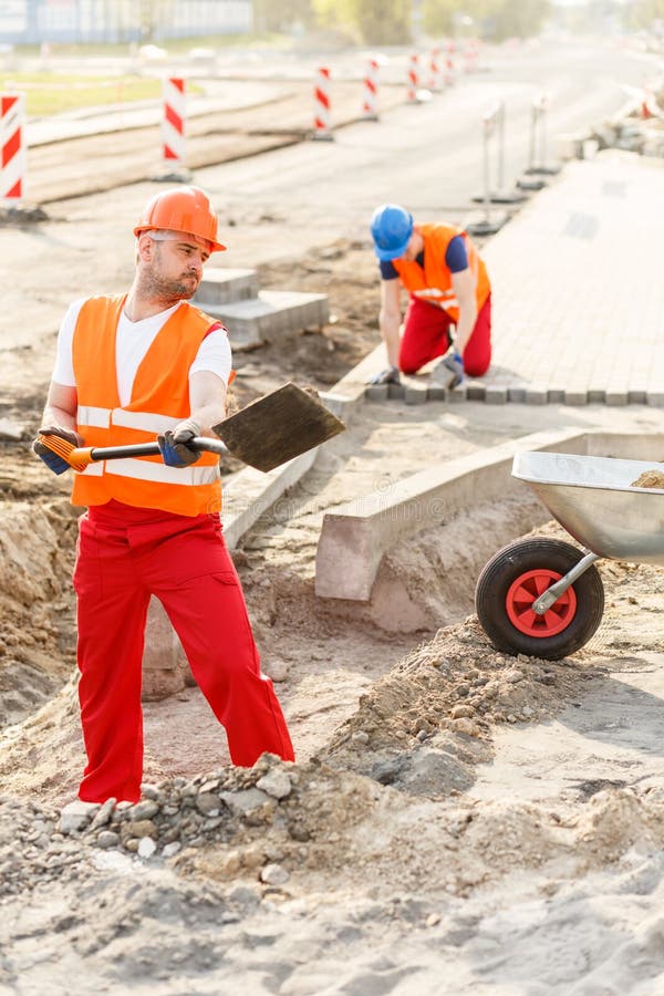 Construction Workers Building New Road Stock Photo - Image of street ...