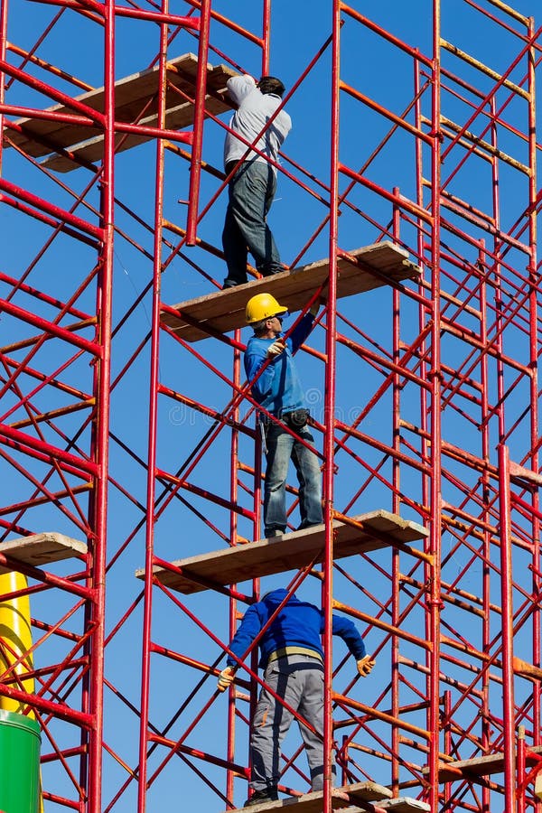Construction Workers Building a New Structure in City Editorial Photo ...