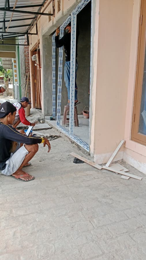 Construction Workers, Building Repairs Editorial Stock Photo - Image of repai, workers: 308637258