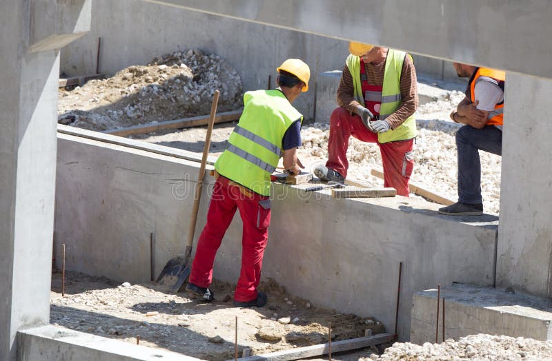 Construction Workers at Building Site Editorial Image - Image of ...