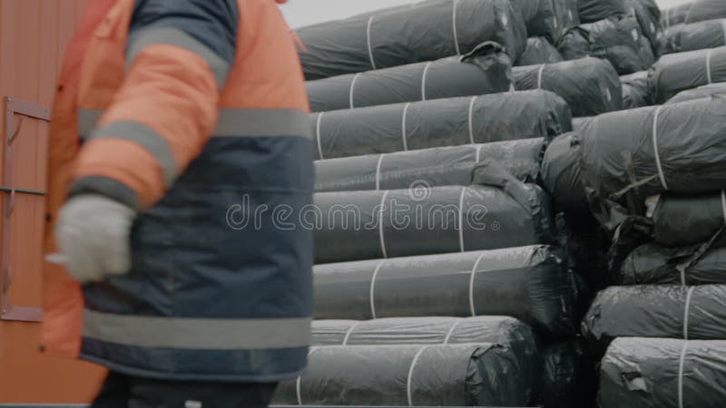 Construction Workers Carry Profile Pipe Together for Cutting Stock ...