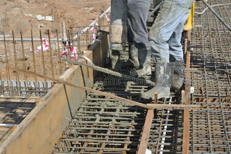 Construction Workers Casting Concrete Using Concrete Hose Stock Image ...