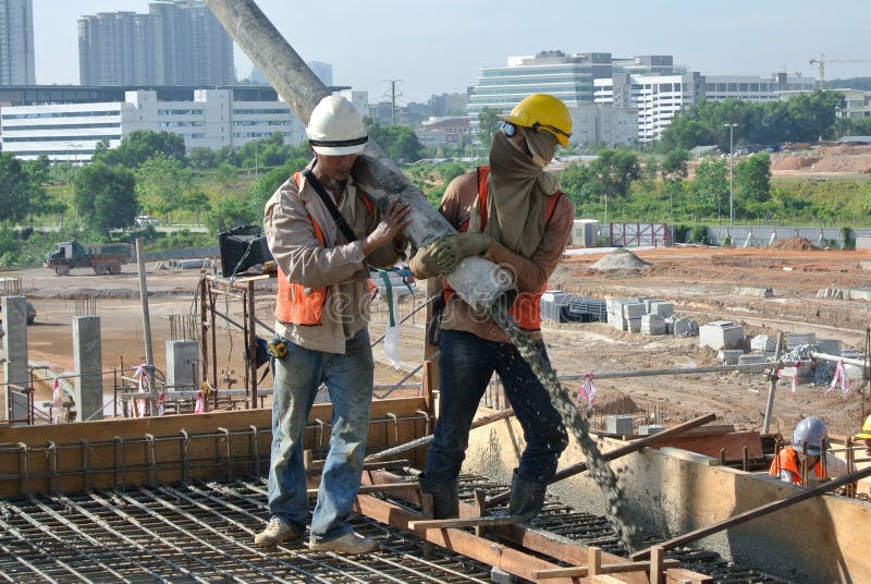 Construction Workers Casting Concrete Using Concrete Hose Editorial ...