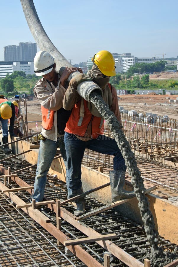 Construction Workers Casting Concrete Using Concrete Hose Editorial ...
