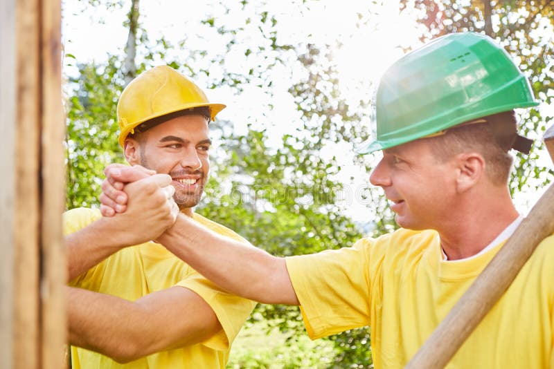 Construction Workers Celebrate Teamwork Performance Stock Photo - Image ...