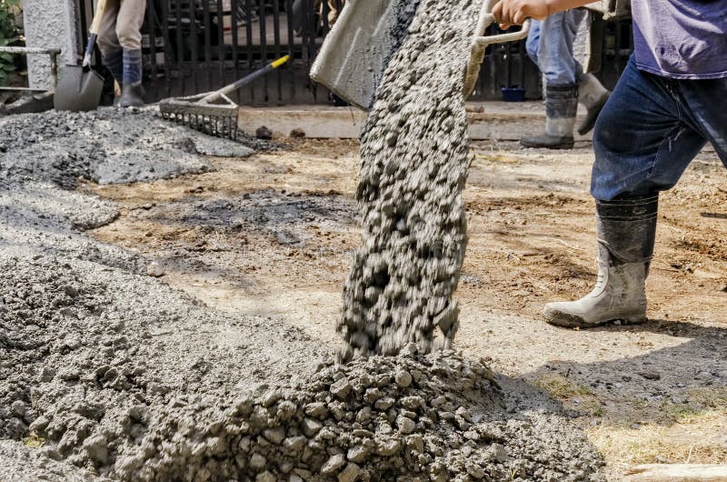 Construction Workers Cementing Road Stock Photo - Image of improvement ...
