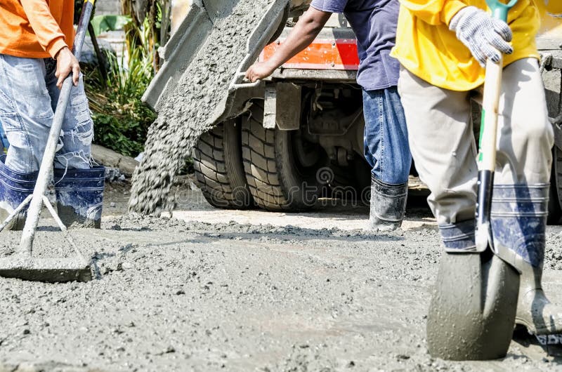 Construction Workers Cementing Road Stock Photo - Image of plaster ...