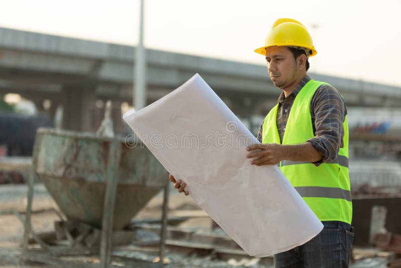 Construction Workers Check Drawings Plan Blueprint Stock Image - Image ...