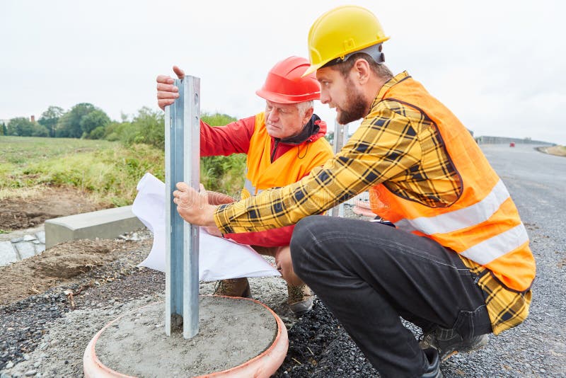 Construction Workers Check Construction on Construction Site Stock ...