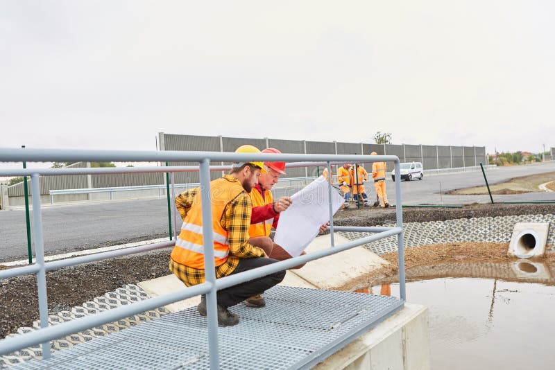 Construction Workers Check Construction on the Construction Site Stock ...
