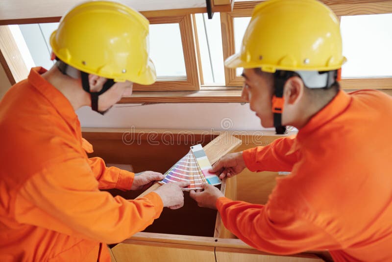 Construction Workers Choosing Color Stock Photo - Image of discussion ...