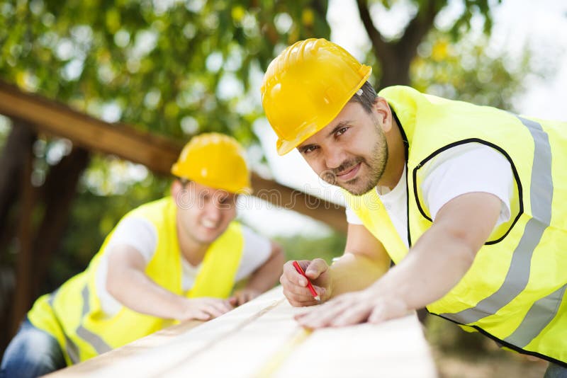 Real people working stock image. Image of construction - 15551097