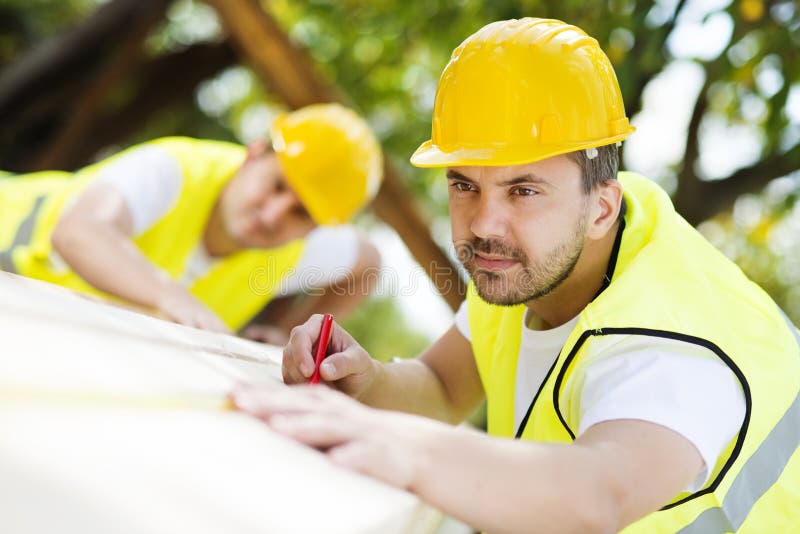 Construction workers stock image. Image of colleagues - 33775271