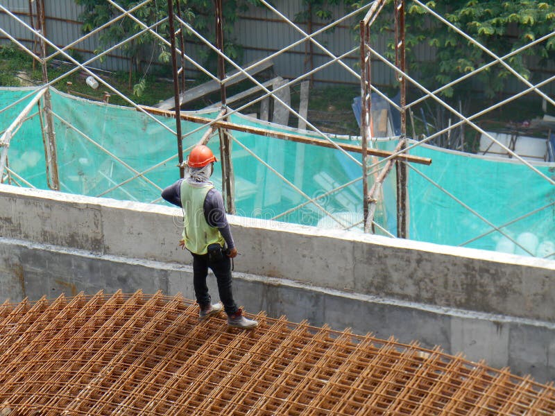 Construction Workers at the Construction Site Doing the daily Routine ...