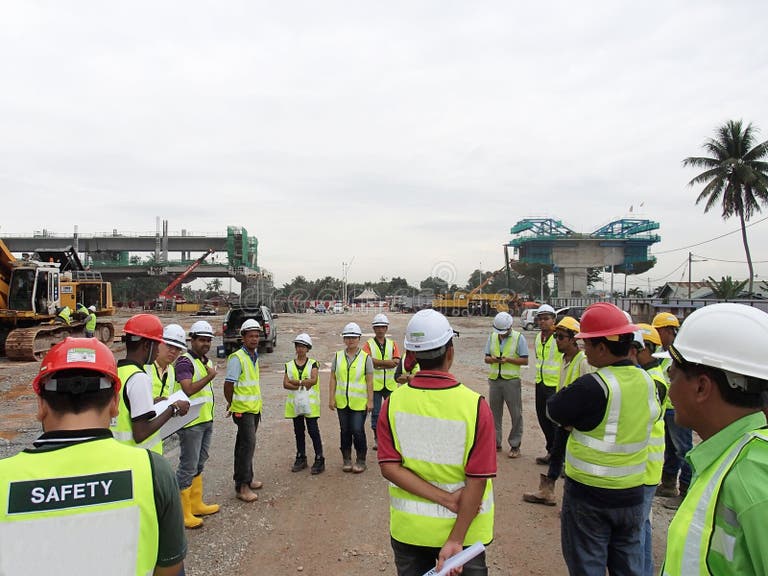 Construction Workers at the Construction Site Doing the daily Routine ...