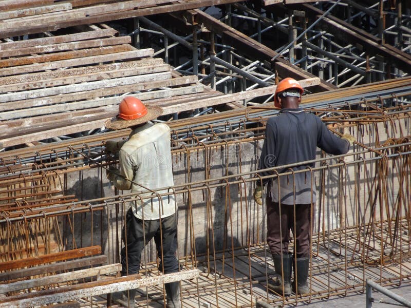 Construction Workers at the Construction Site. Editorial Stock Image ...