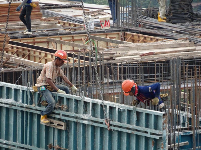 Construction Workers at the Construction Site. Editorial Image - Image ...