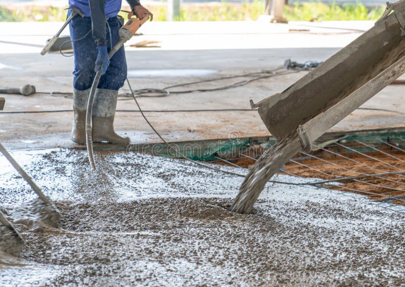 Construction Workers Dip Vibration while Pouring of Concrete Stock ...