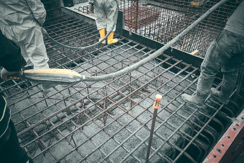 Workers compact concrete stock image. Image of castinplace - 273130549