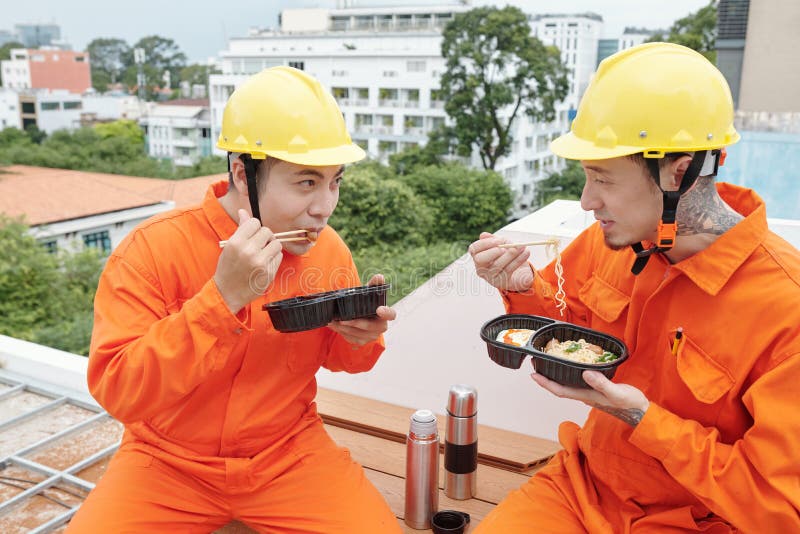 Construction Workers Eating Ramen Stock Photo - Image of chatting ...