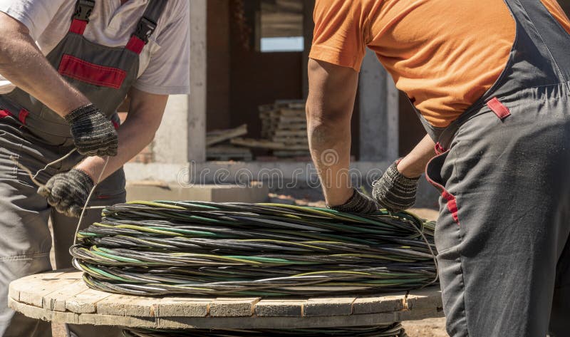 Work Electricians at a Construction Site Stock Image - Image of outdoor ...