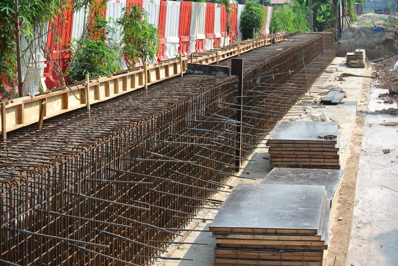 Construction Workers Fabricate Retaining Wall Reinforcement Bar ...