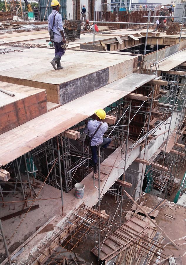 Construction Workers Fabricated Timber Form Work at the Construction ...