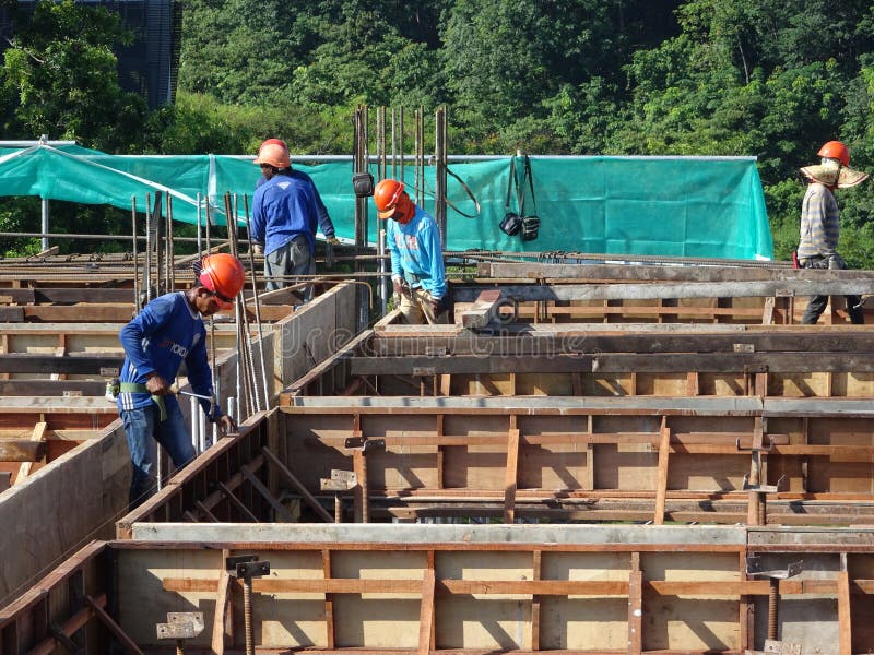Construction Workers Fabricated Timber Form Work at the Construction ...