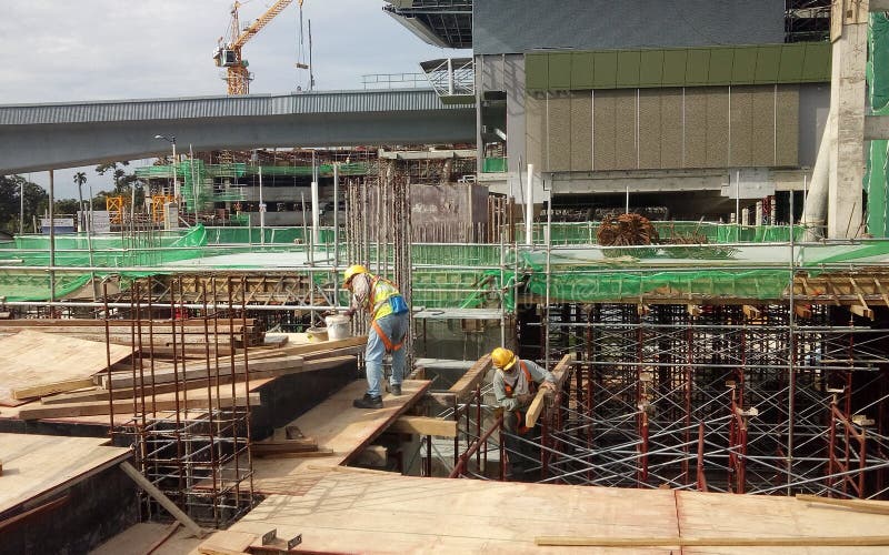 Construction Workers Fabricated Timber Form Work at the Construction ...