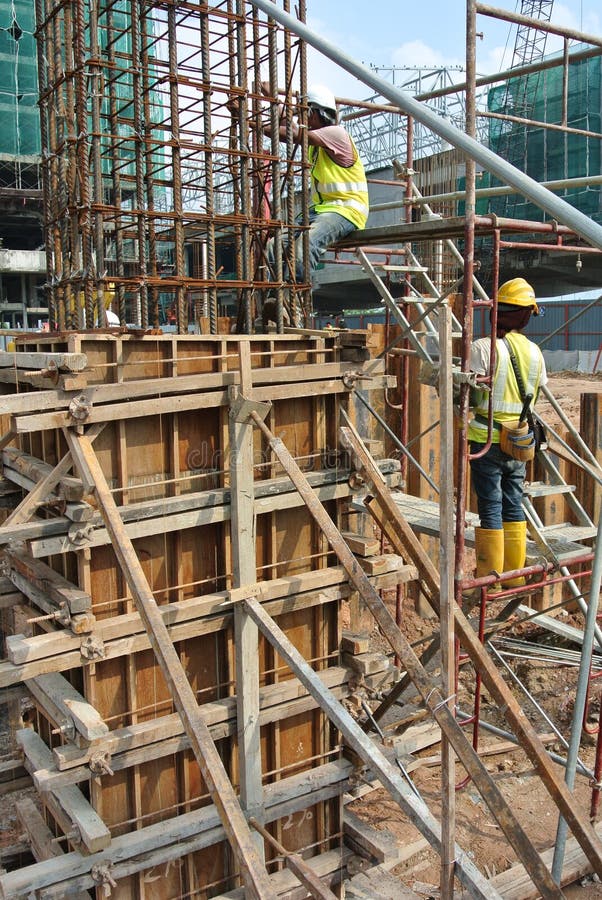 Construction Workers Fabricating Timber Column Formwork at the ...