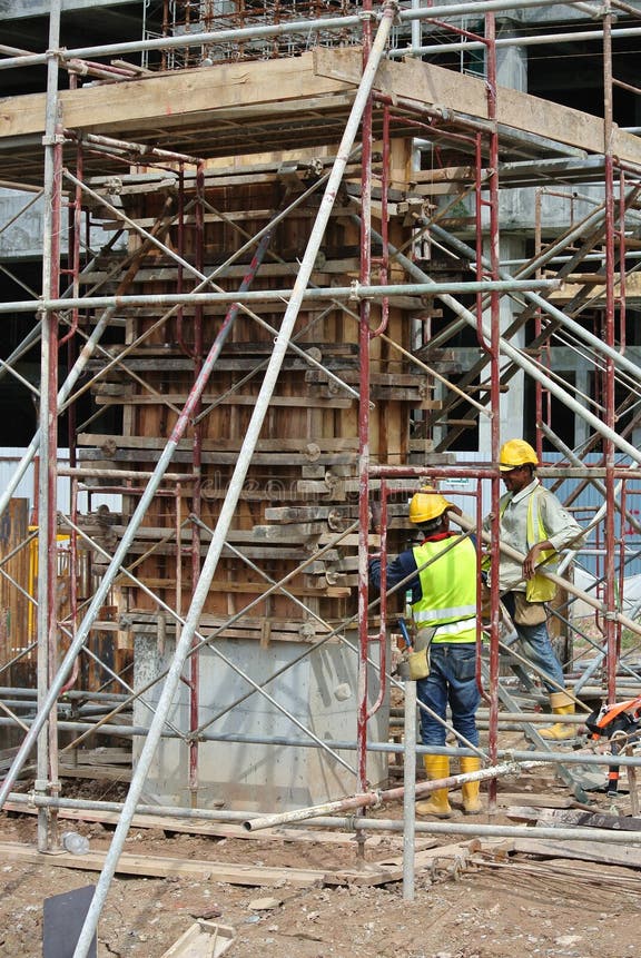 Construction Workers Fabricating Timber Column Formwork at the ...
