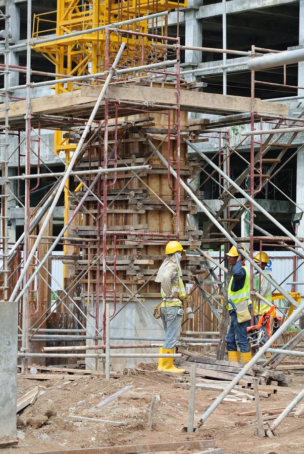 Construction Workers Fabricating Timber Column Formwork at the ...
