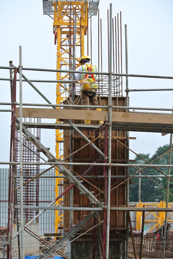 Construction Workers Fabricating Timber Column Formwork at the ...