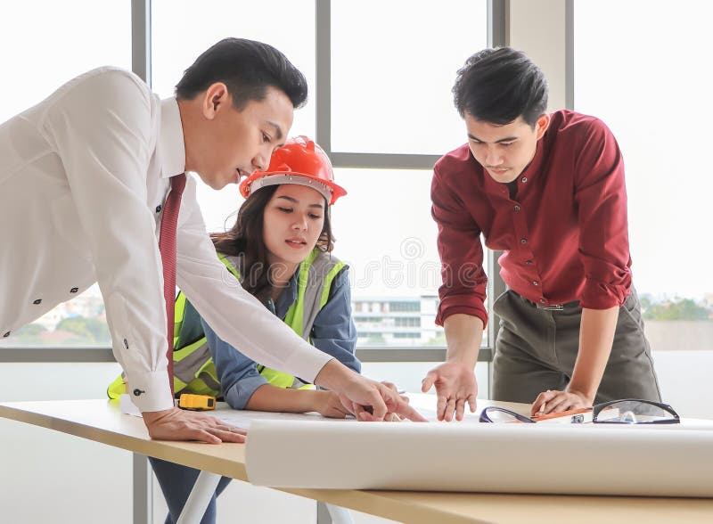 Construction Workers , a Female Architect and Two Male Engineers ...