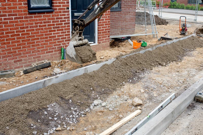 Construction Workers Finishing Construction of New Residential House ...