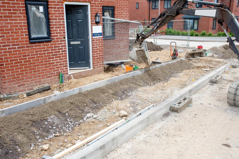 Construction Workers Finishing Construction of New Residential House ...