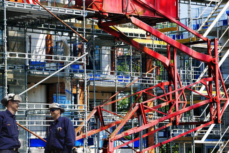 Construction Workers and Giant Building Site Stock Photo - Image of ...