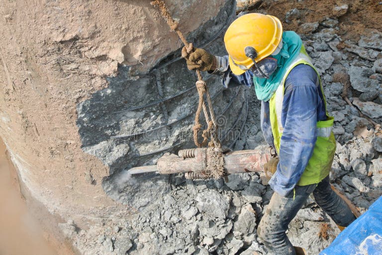 A Construction Workers Hacking Foundation Pile Editorial Photography ...